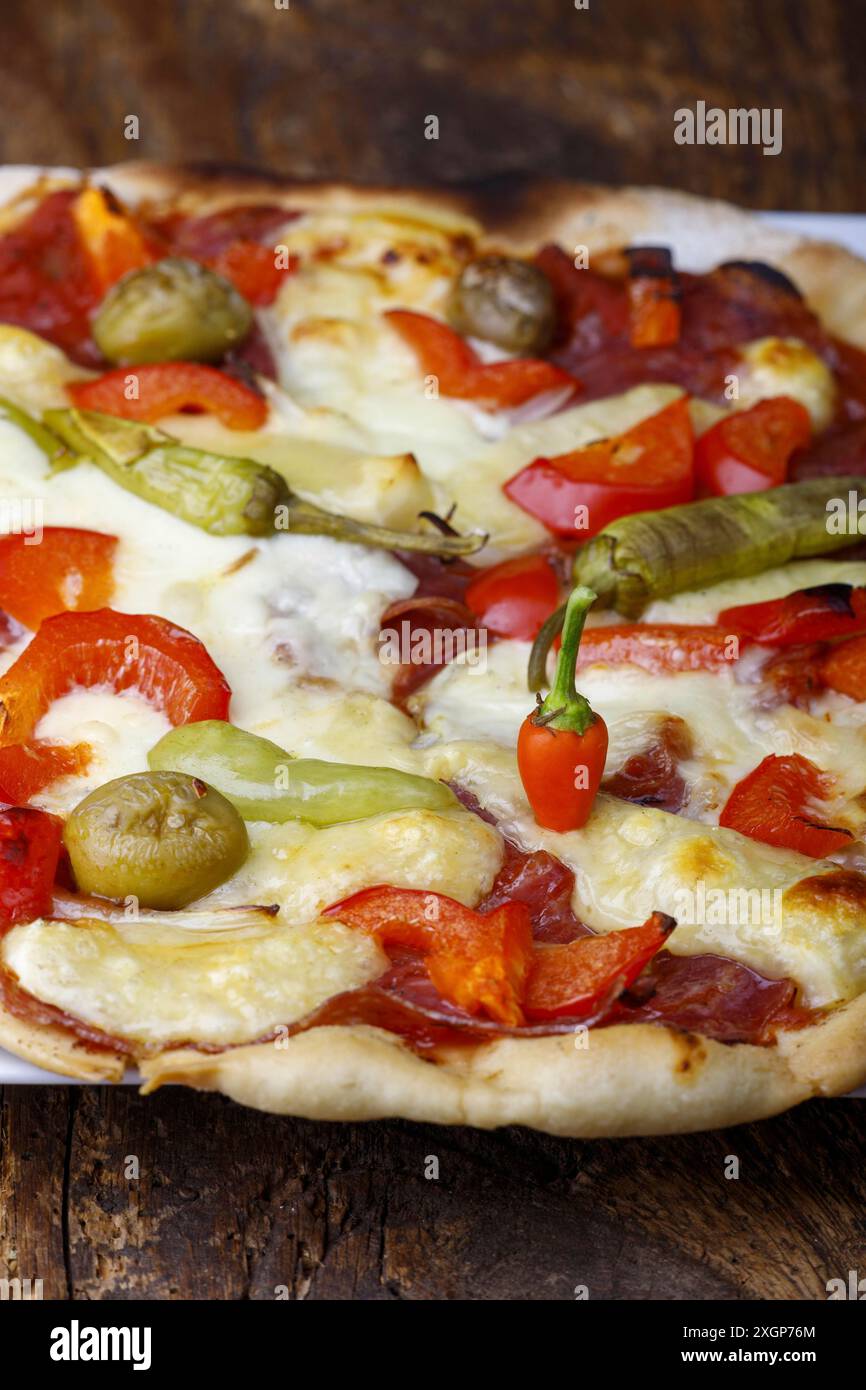 Red chilli on a delicious pizza Stock Photo - Alamy