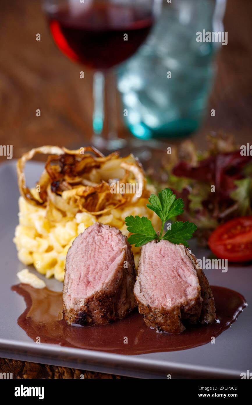Pork filet with swabian pasta Stock Photo - Alamy