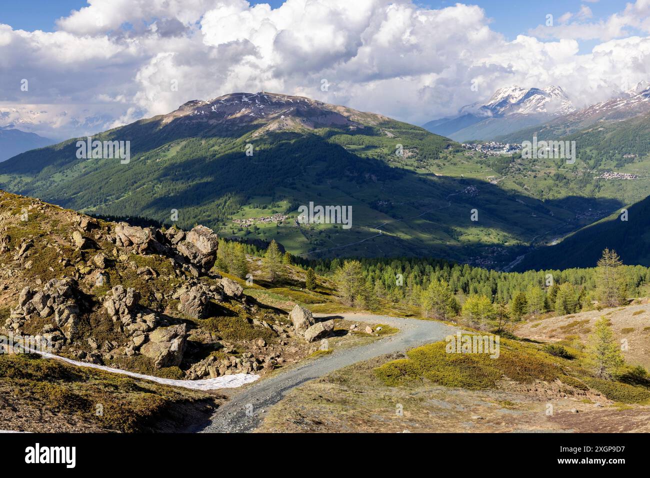 Mountain panorama with view of Sestriere, mountain road at Col Bousson ...