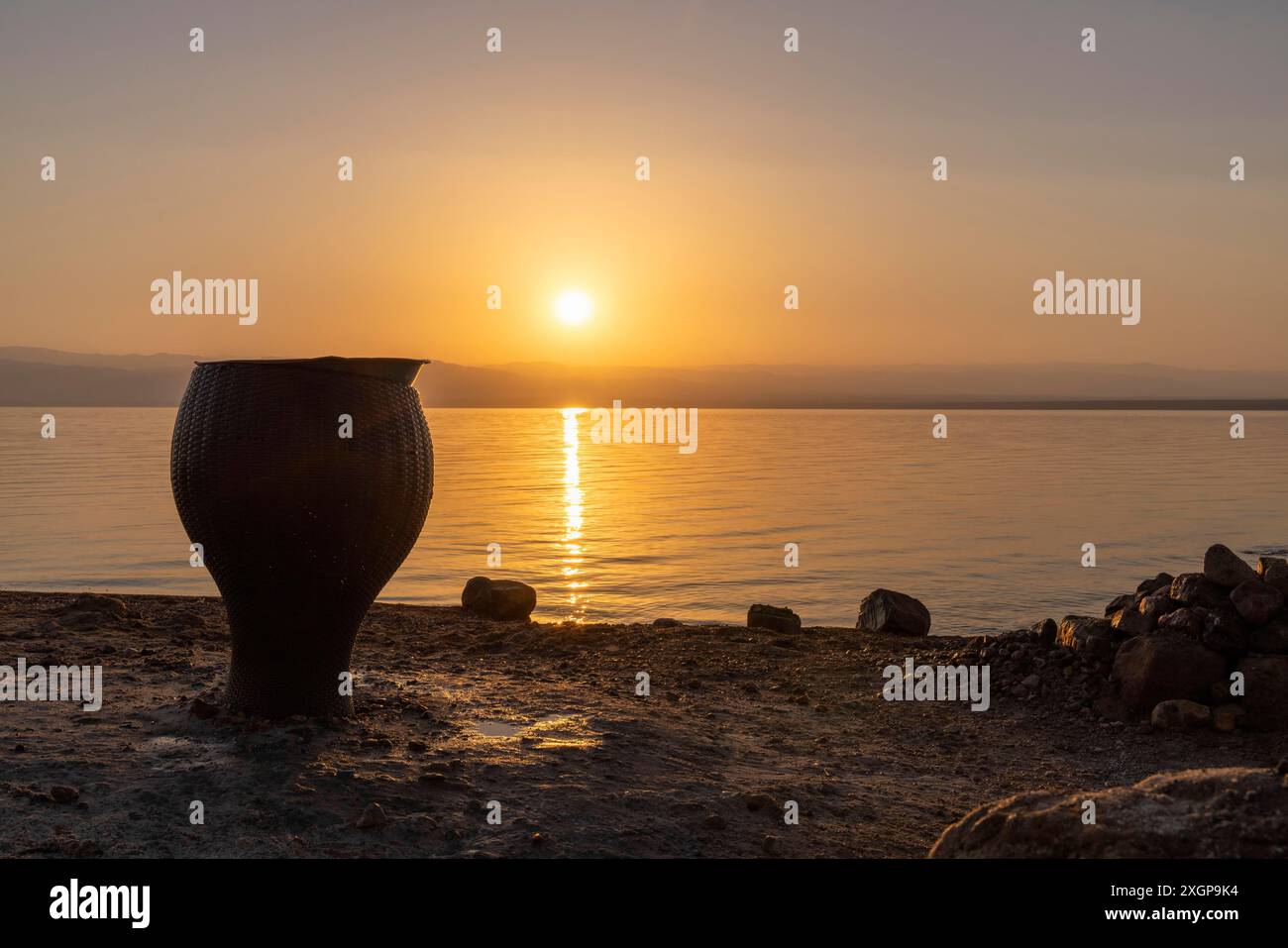 Sunset at the Corniche with vessel with healing mud, coastal section ...