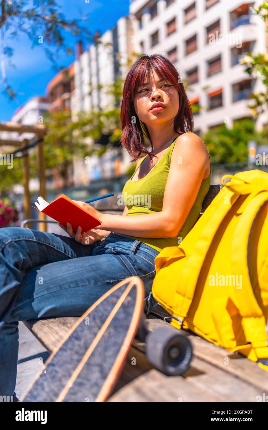 Woman writing diary sports hi-res stock photography and images - Alamy