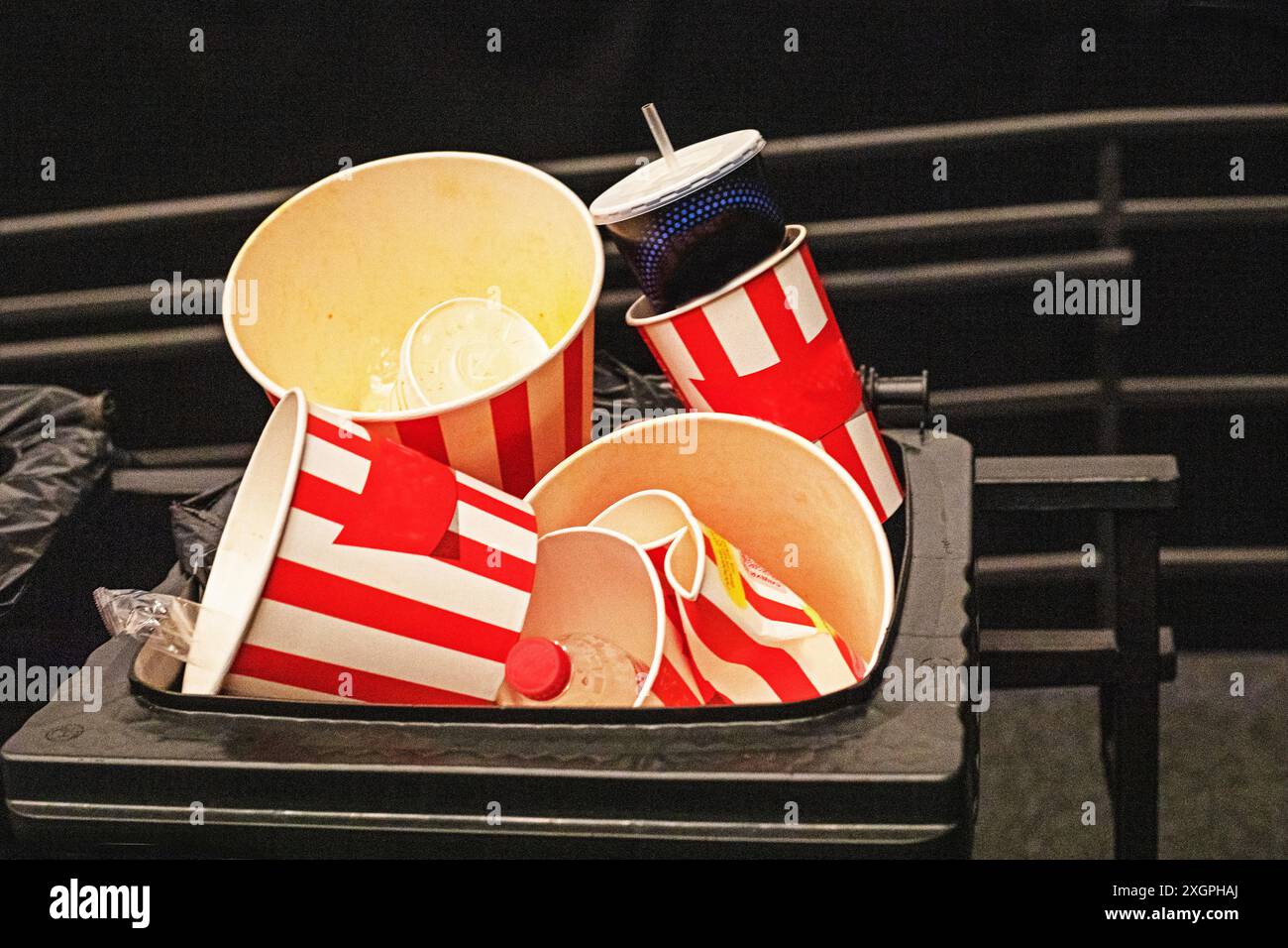 packaging into the trash after pop-con after a movie show. Family ...