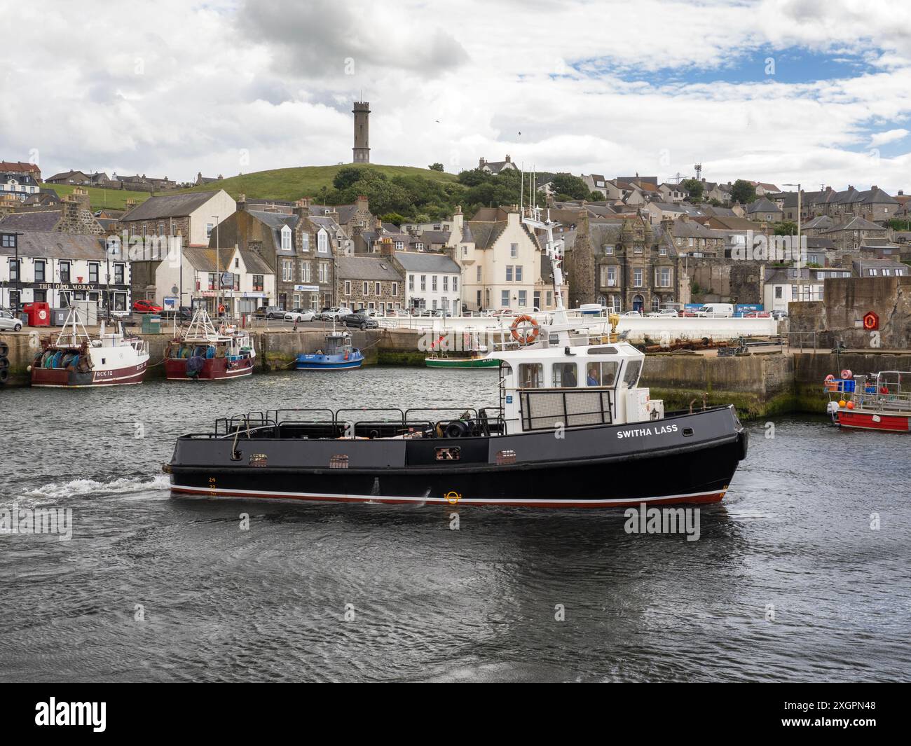A tug in the harbour at Macduff in Aberdeenshire, Scotland, UK Stock ...