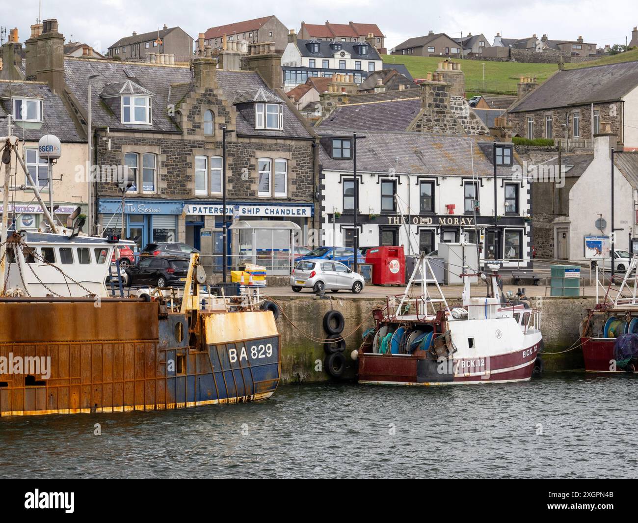 Fishing trawlers in the harbour, at Macduff in Aberdeenshire, Scotland ...