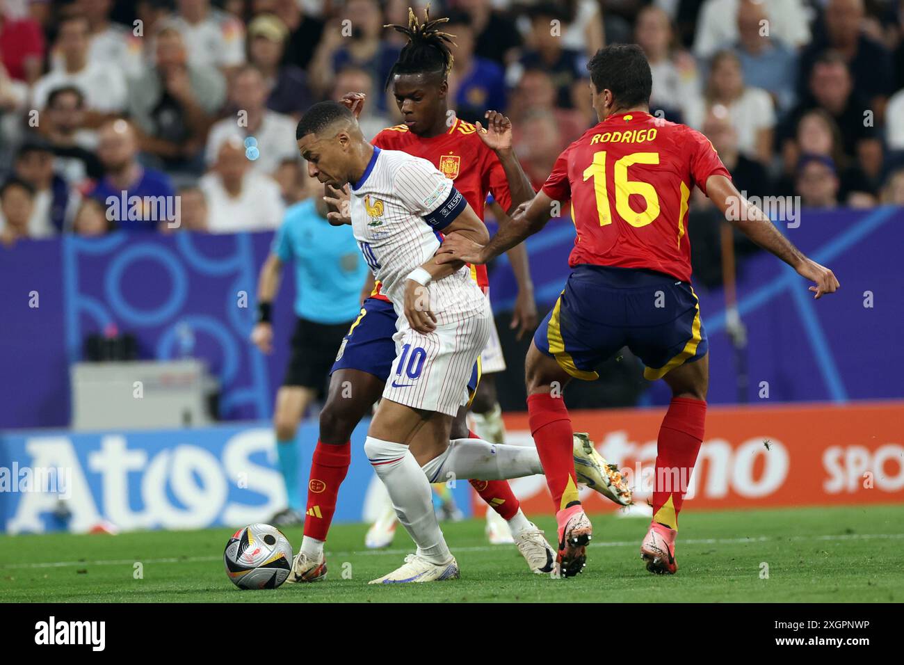 Munich , Germany 09.07.2024: Kylian Mbappe of France Rodri of Spain ...