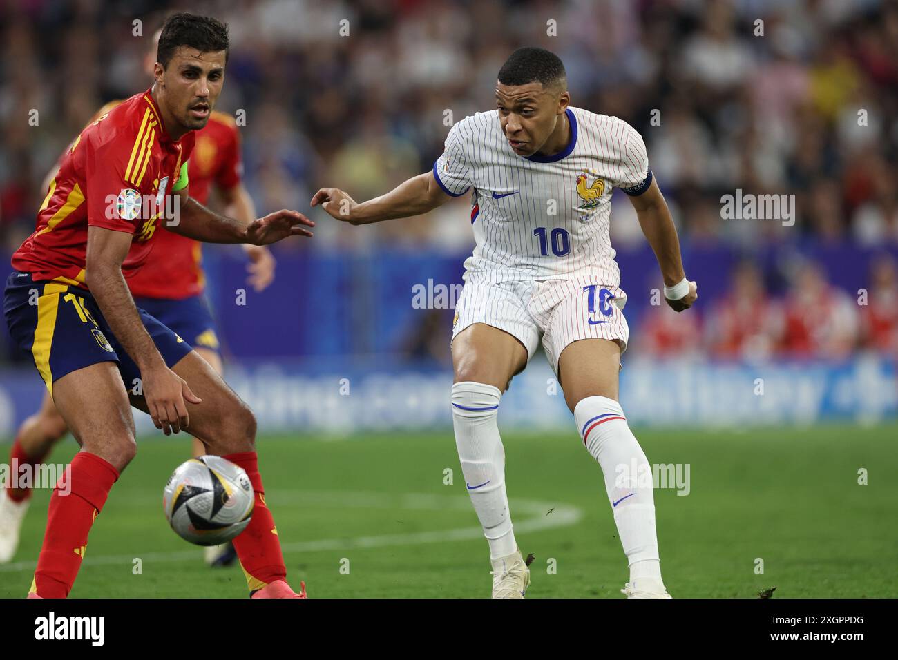 Munich , Germany 09.07.2024: Rodri of Spain, Kylian Mbappe of France ...