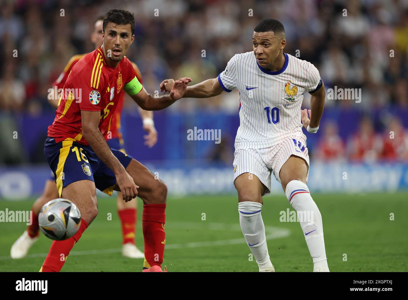 Munich, Germany 09.07.2024: Rodri of Spain, Kylian Mbappe of France ...