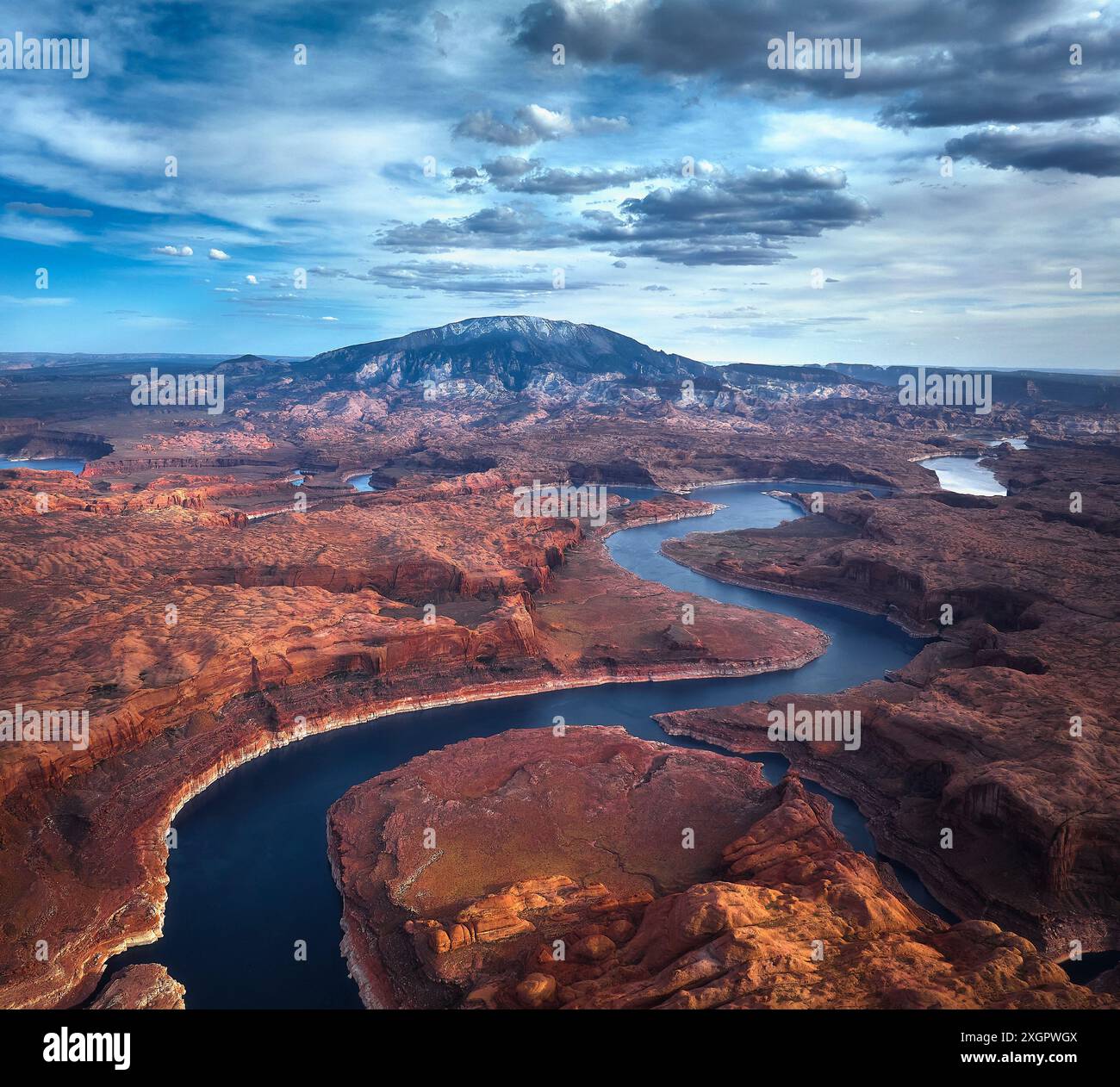 An aerial view of San Juan River Goosenecks, Utah under a cloudy sky ...