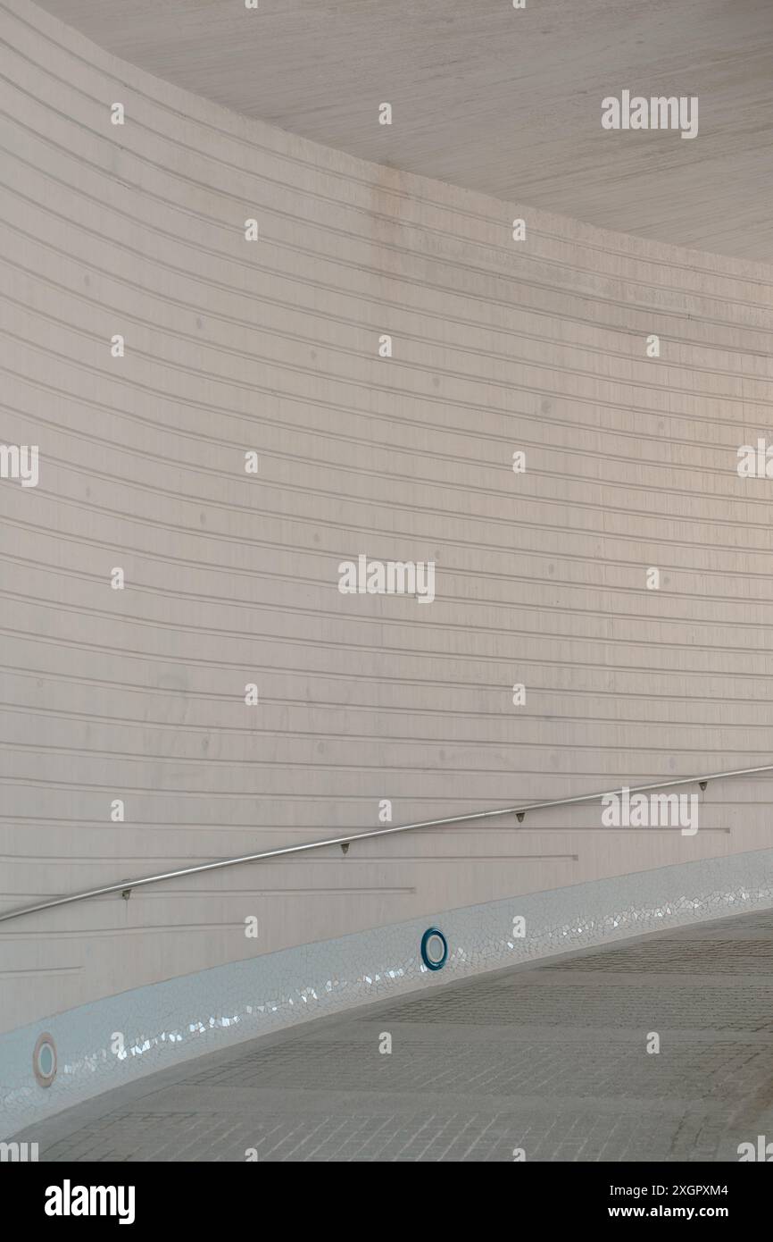 Close-up of a building interior showcasing a curved wall with ...