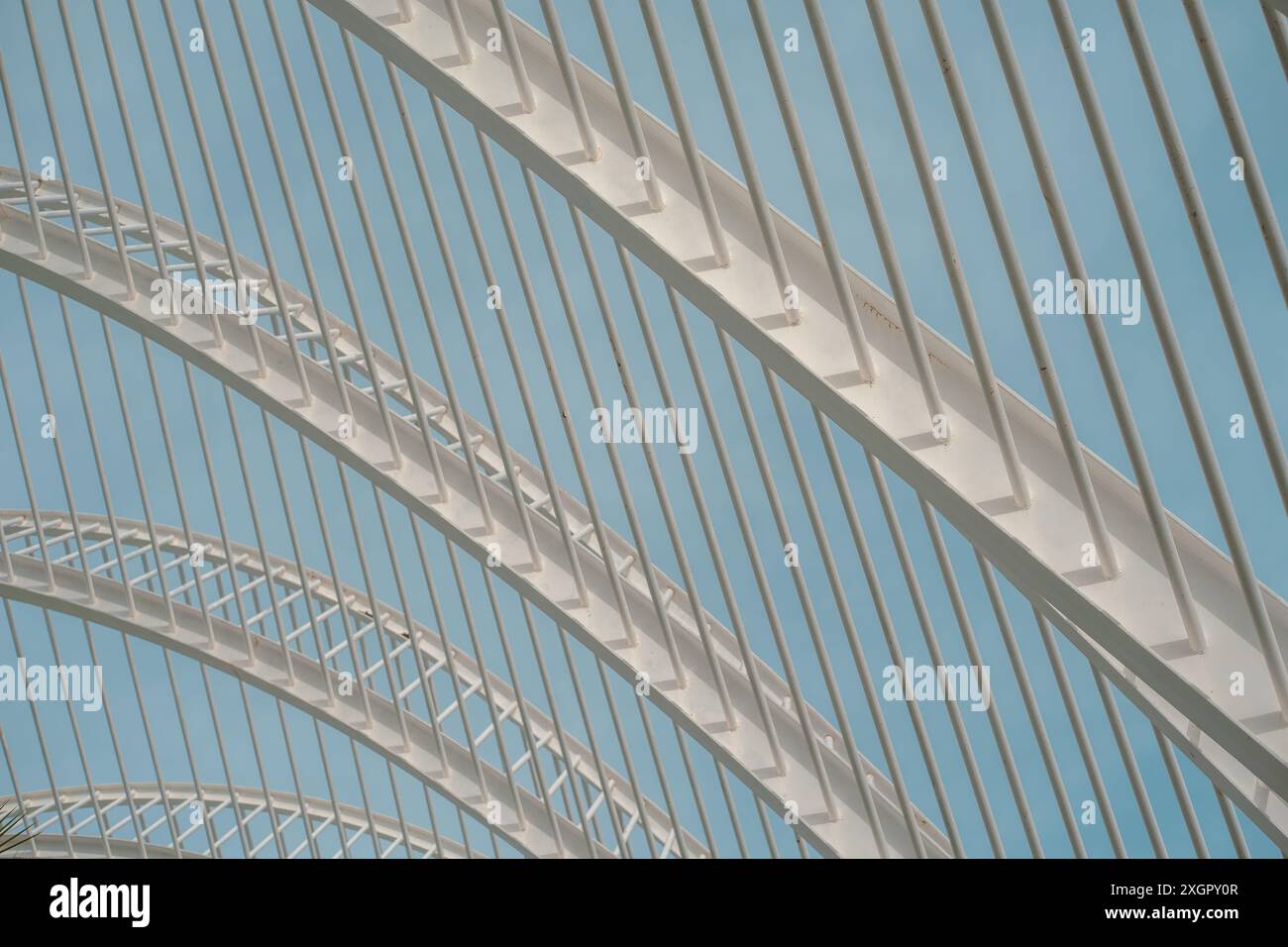 Close-up of a modern lattice structure with white bars set against a ...