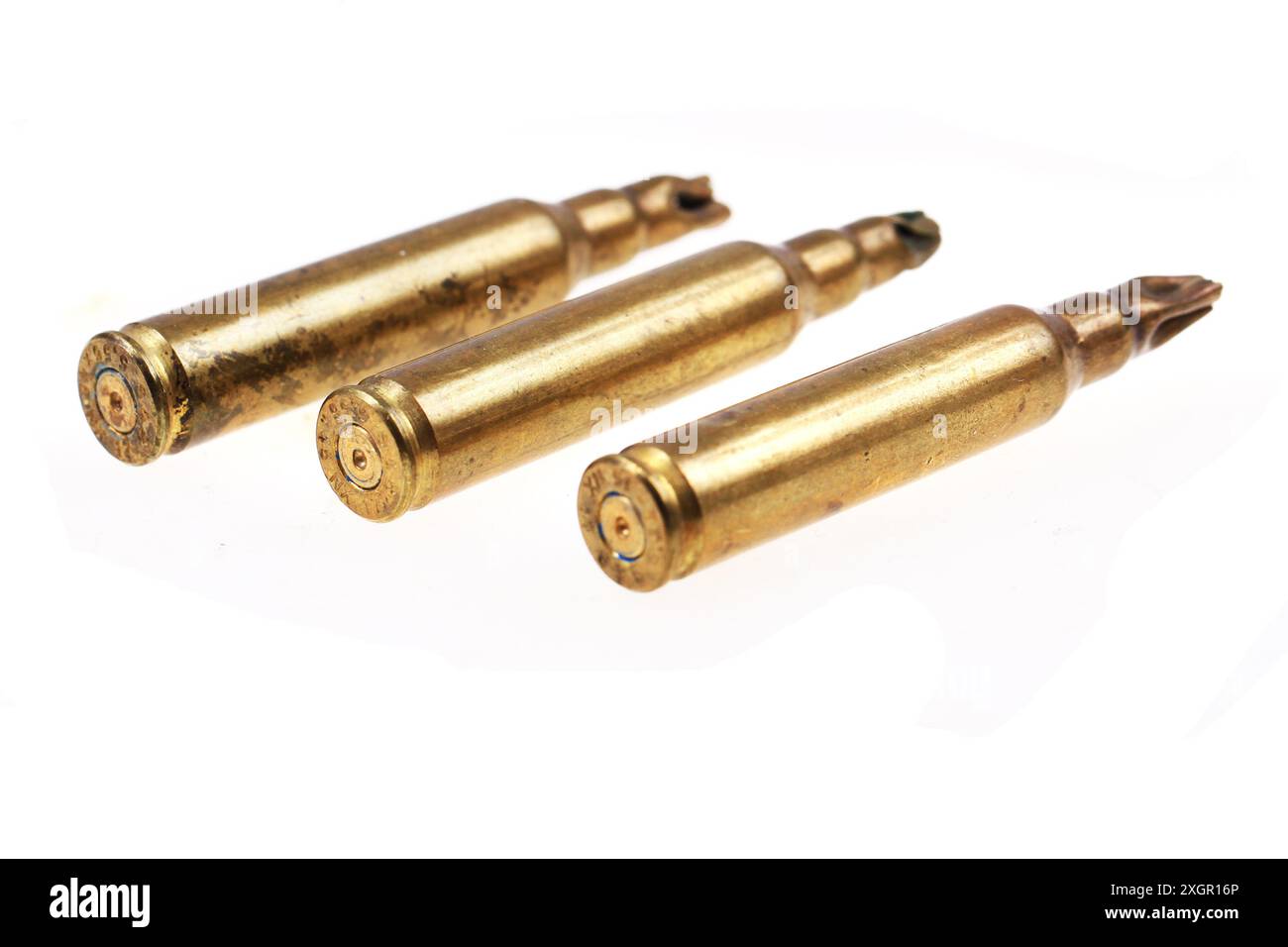 three metal bullets isolated on the white background Stock Photo - Alamy