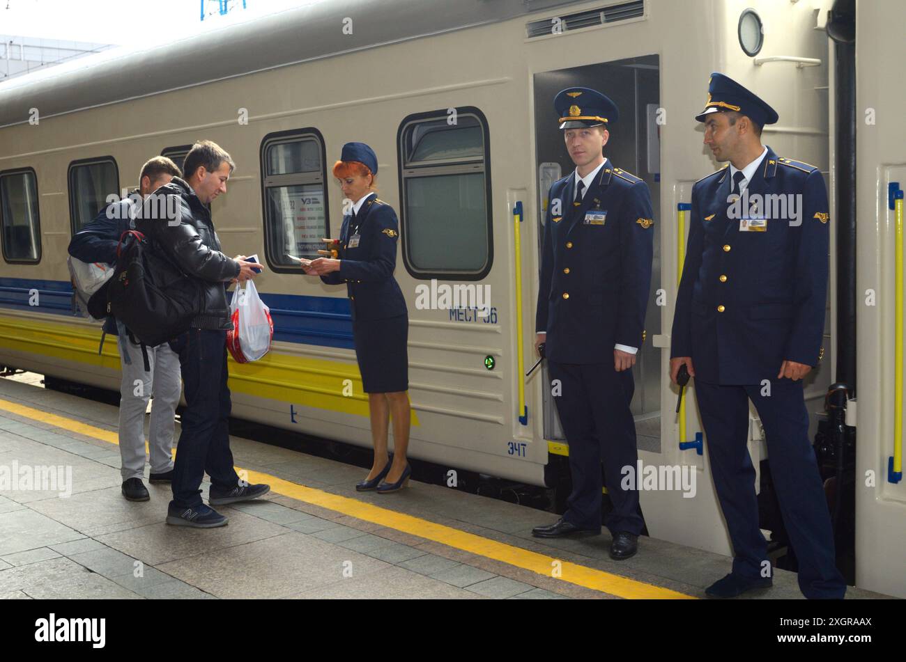 Standing in front of door of train hi-res stock photography and images ...