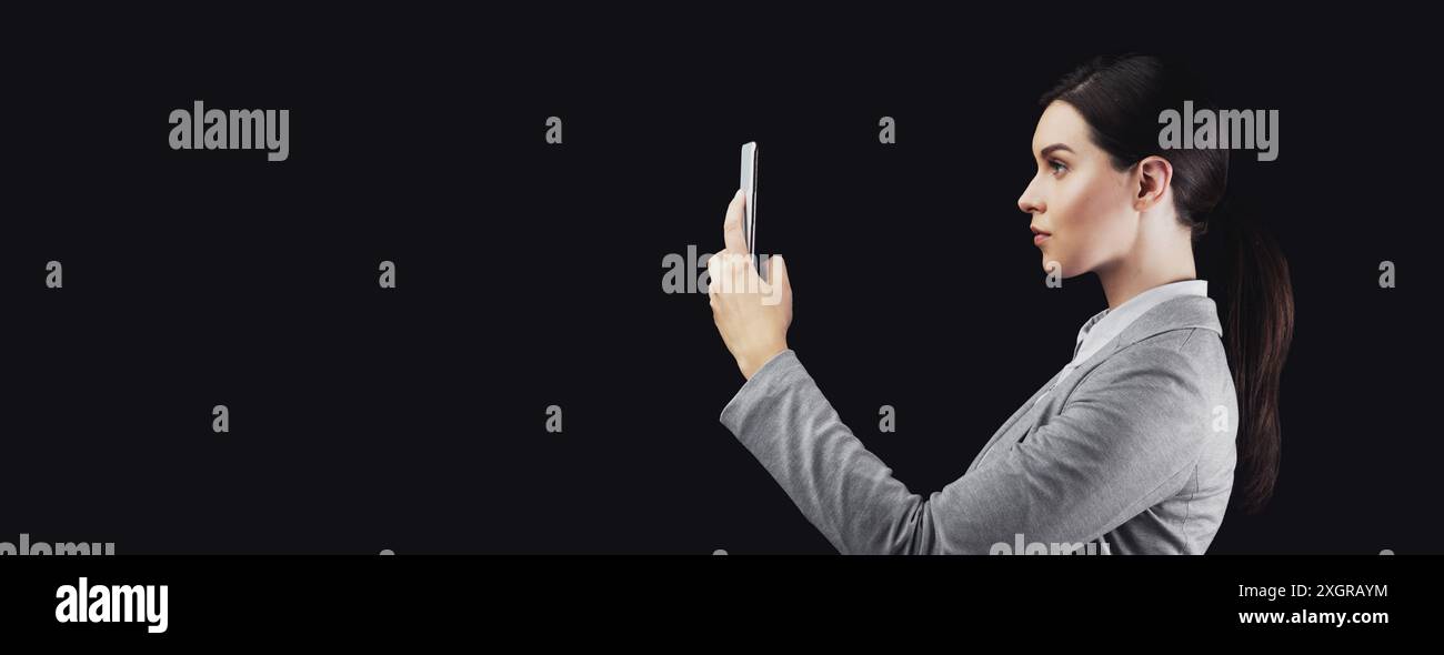 Woman Holding Smartphone in Front of Face Stock Photo - Alamy