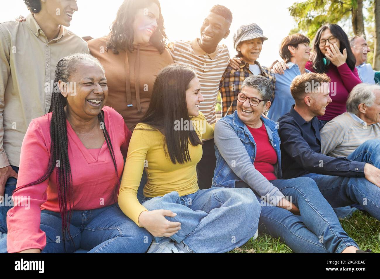 Group of multigenerational people smiling in front of camera - Multiracial friends of different ...