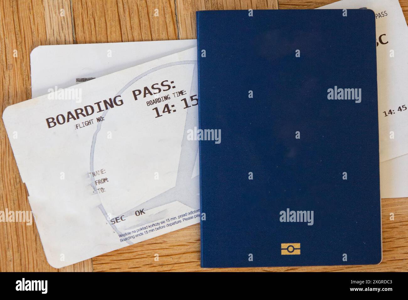 Blue passport and flight ticket Stock Photo - Alamy