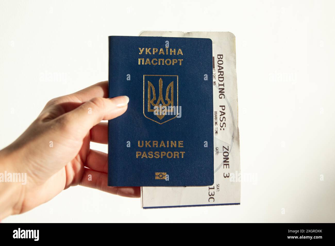 Blue Ukrainian passport and flight ticket Stock Photo - Alamy