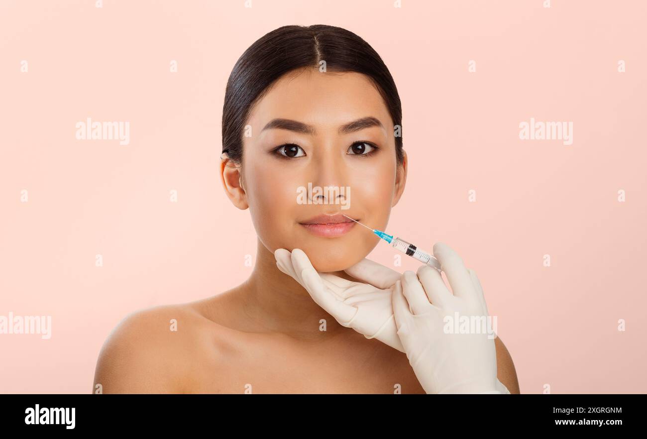 Korean woman receiving injection hi-res stock photography and images ...