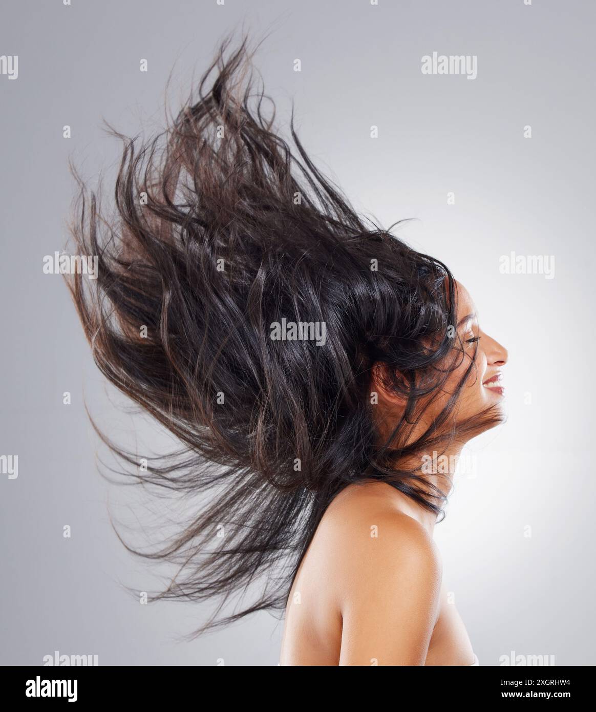 Salon, woman and hair flip in studio with happiness for keratin ...