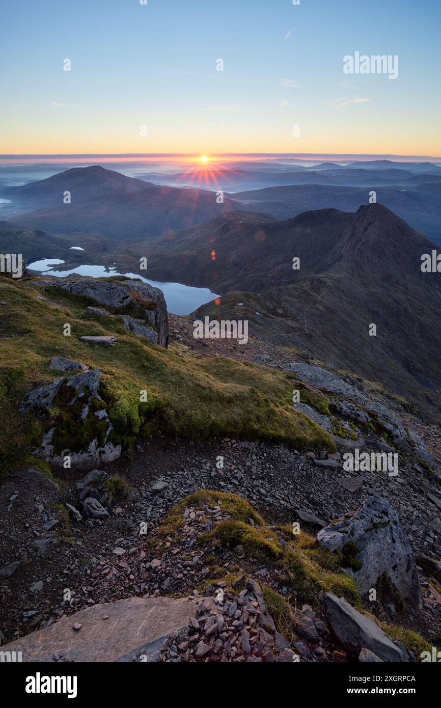 Sunrise as seen from the top of Snowdon, in the Snowdonia National Park ...