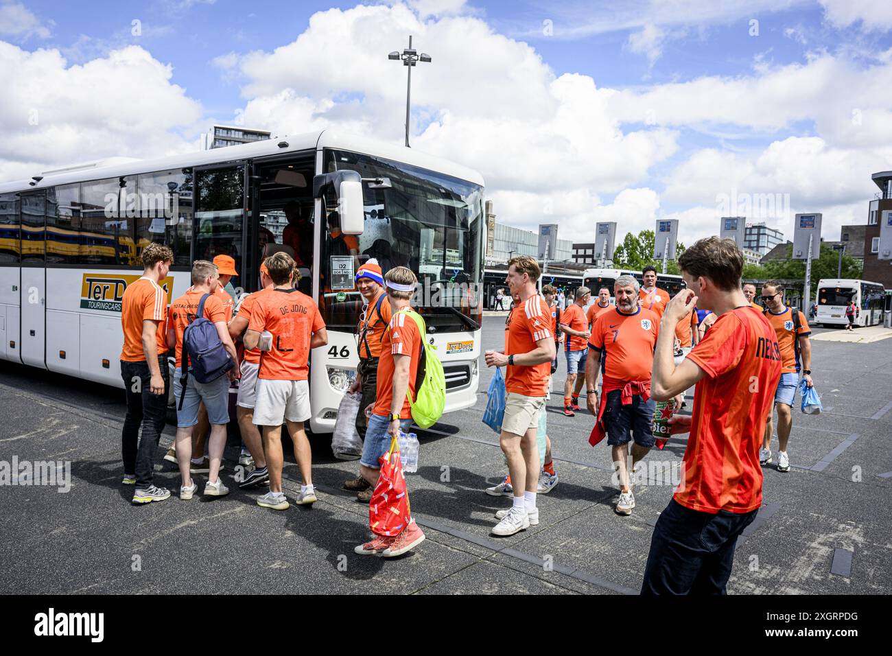ENSCHEDE - Dutch fans board the bus on the day of the semi-final at the ...