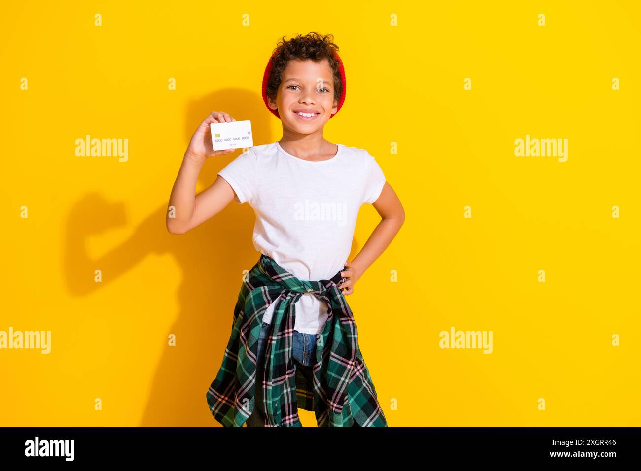 Photo portrait of cute little boy hold credit card dressed stylish ...