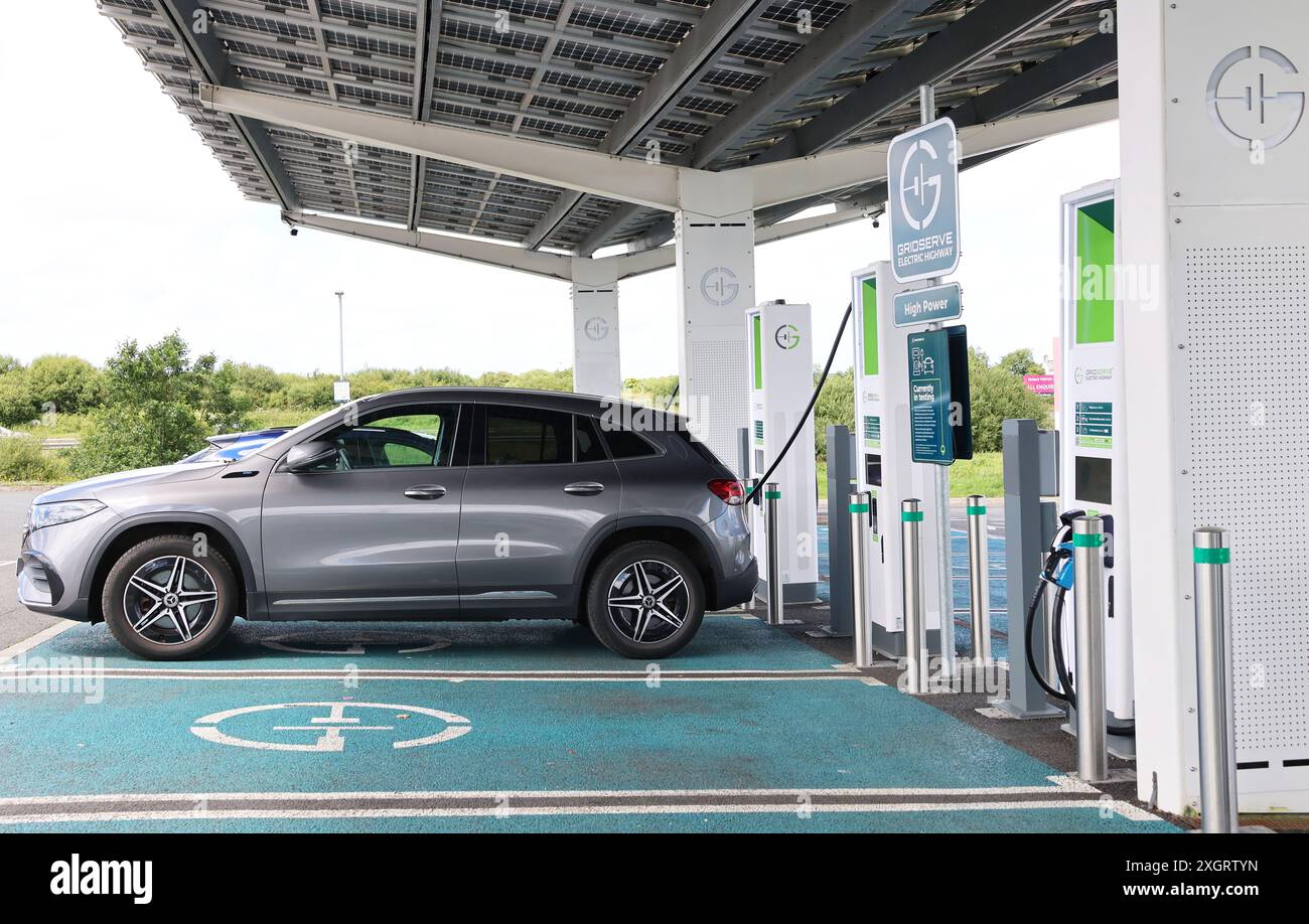 A Mercedes Electric Vehicle recharging at a rapid charge point powered ...