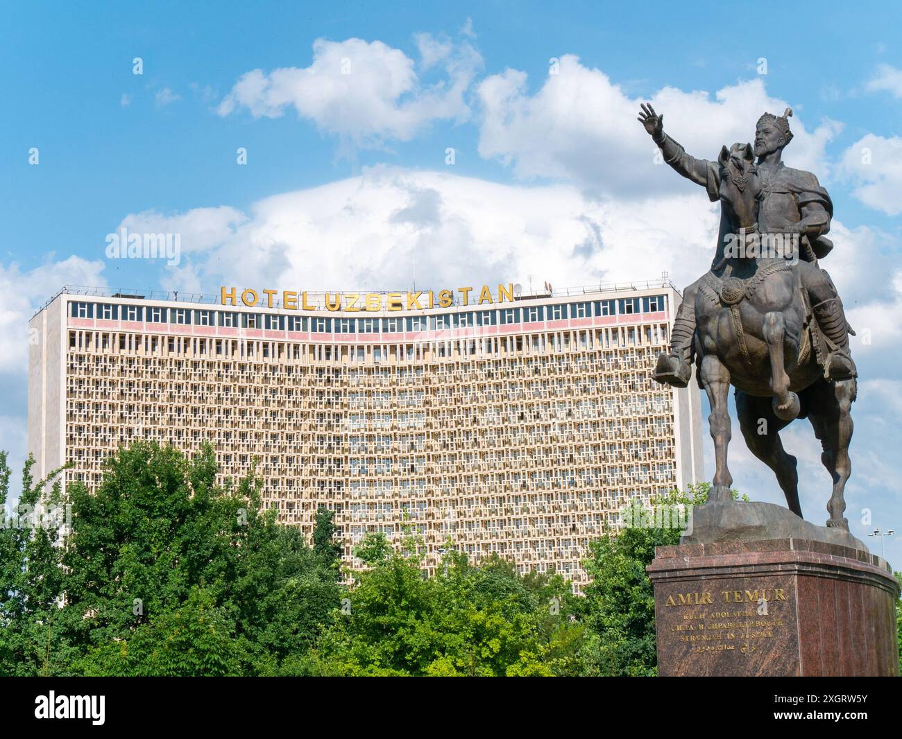 Statue of Amir Temur with Hotel Uzbekistan in the Background at Amir ...