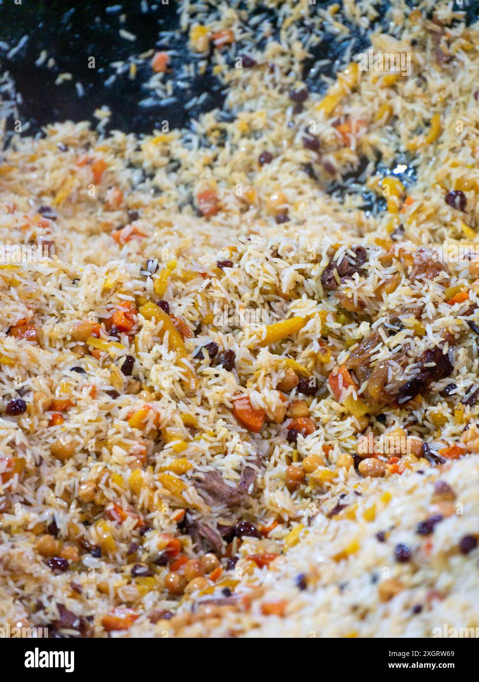 Plov being cooked at Besh Qozon Pilaf Center in Tashkent, Uzbekistan ...