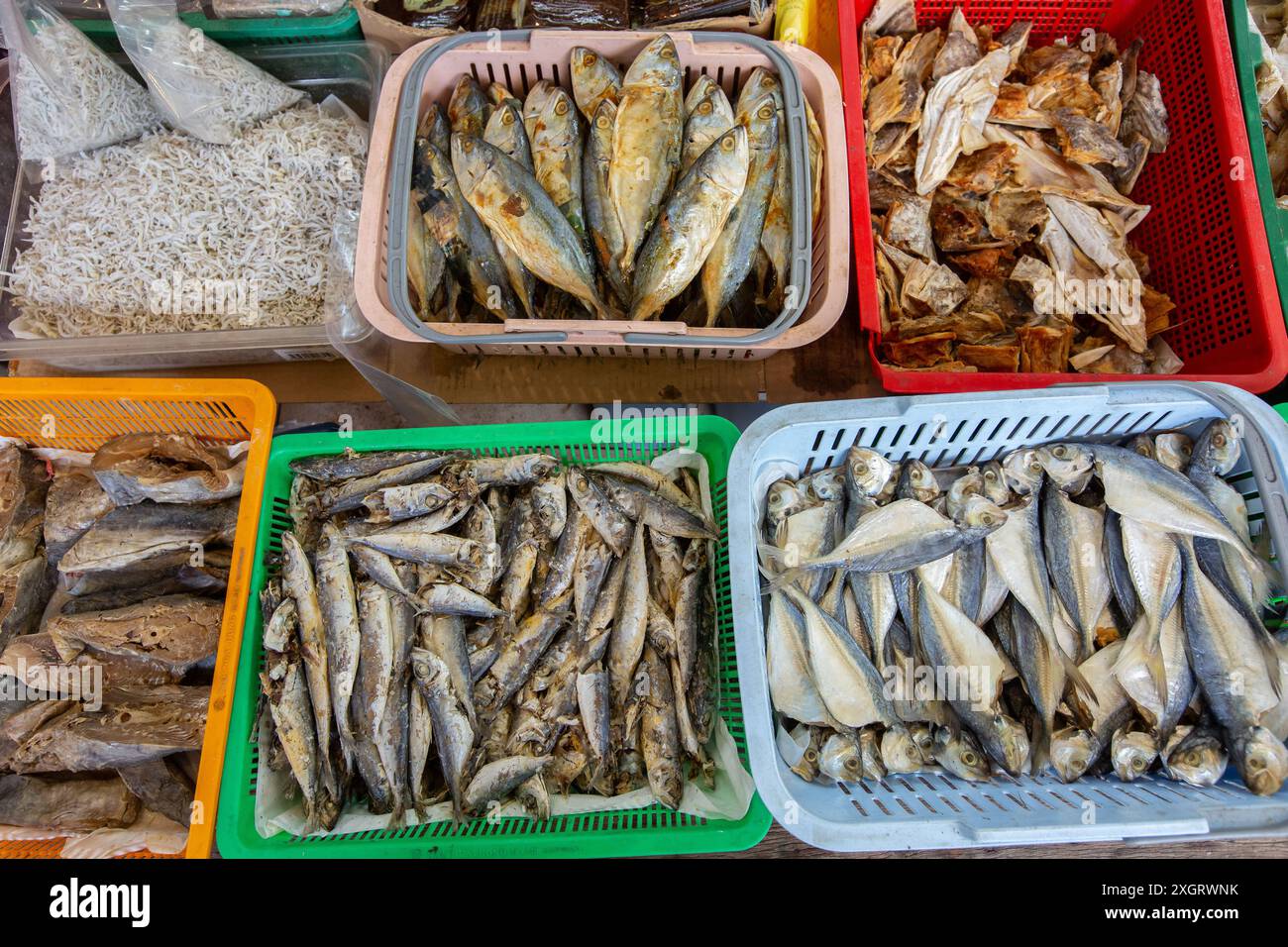 Variety of fermented salted fish on sale, neat layout for customers to ...