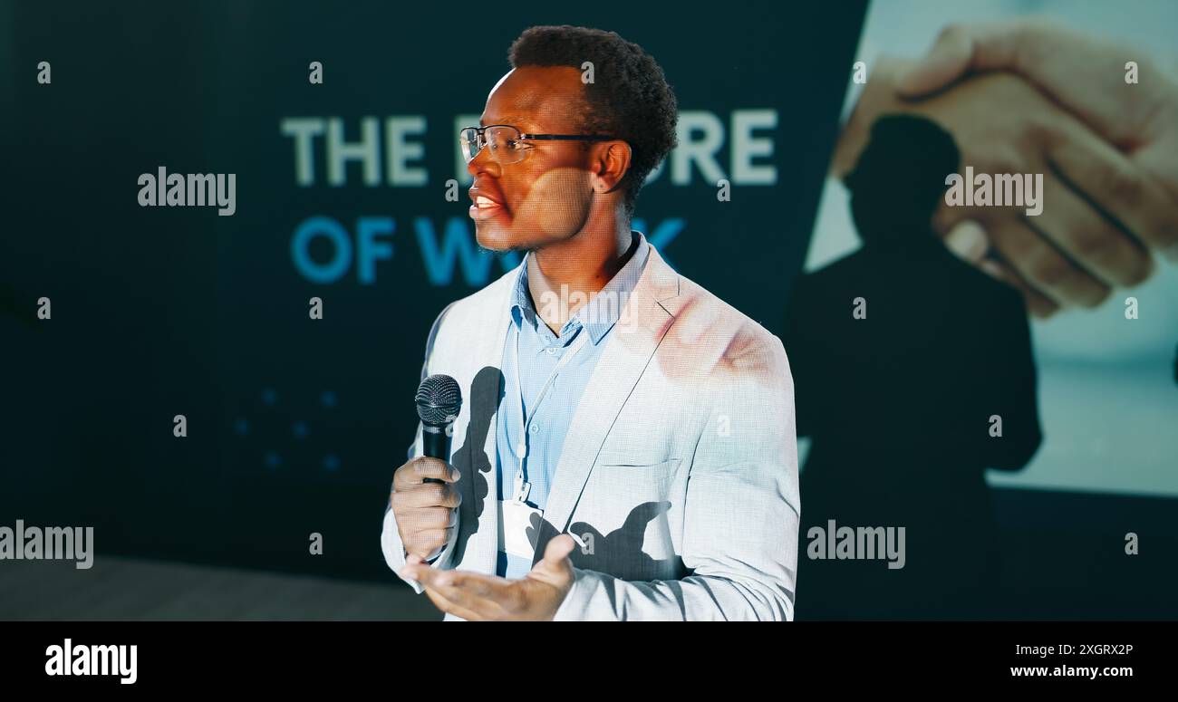 Future, presentation and speech of man with microphone on stage for ...
