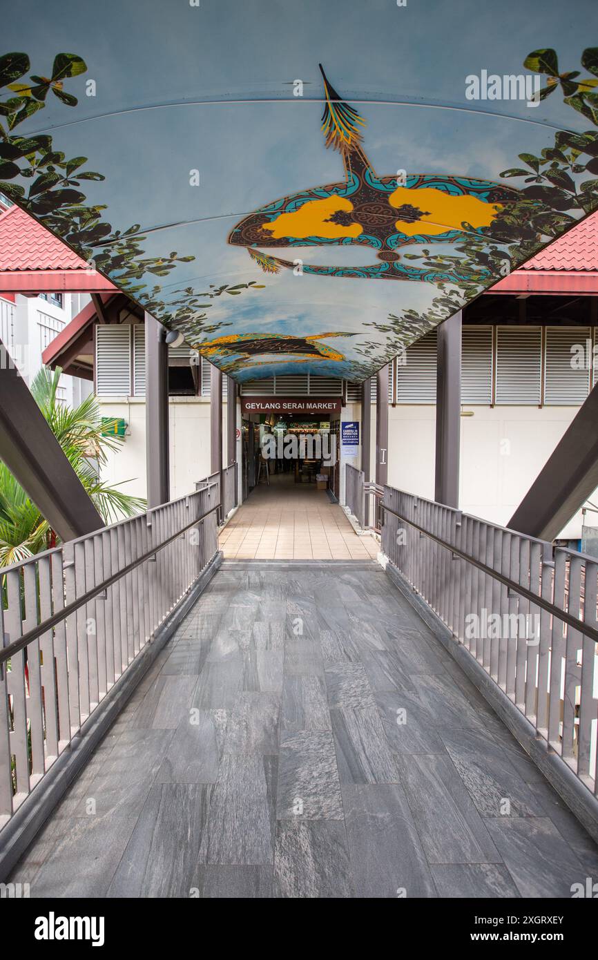 Vertical view. Through the bridge can see a wall art mural design ...