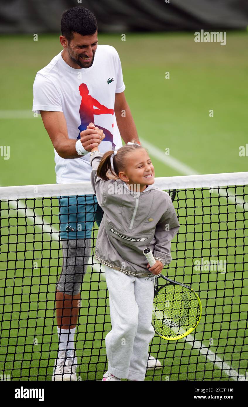 Novak Djokovic with his daughter Tara on day ten of the 2024 Wimbledon ...