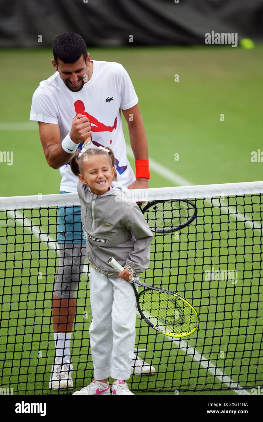 Novak Djokovic with his daughter Tara on day ten of the 2024 Wimbledon ...