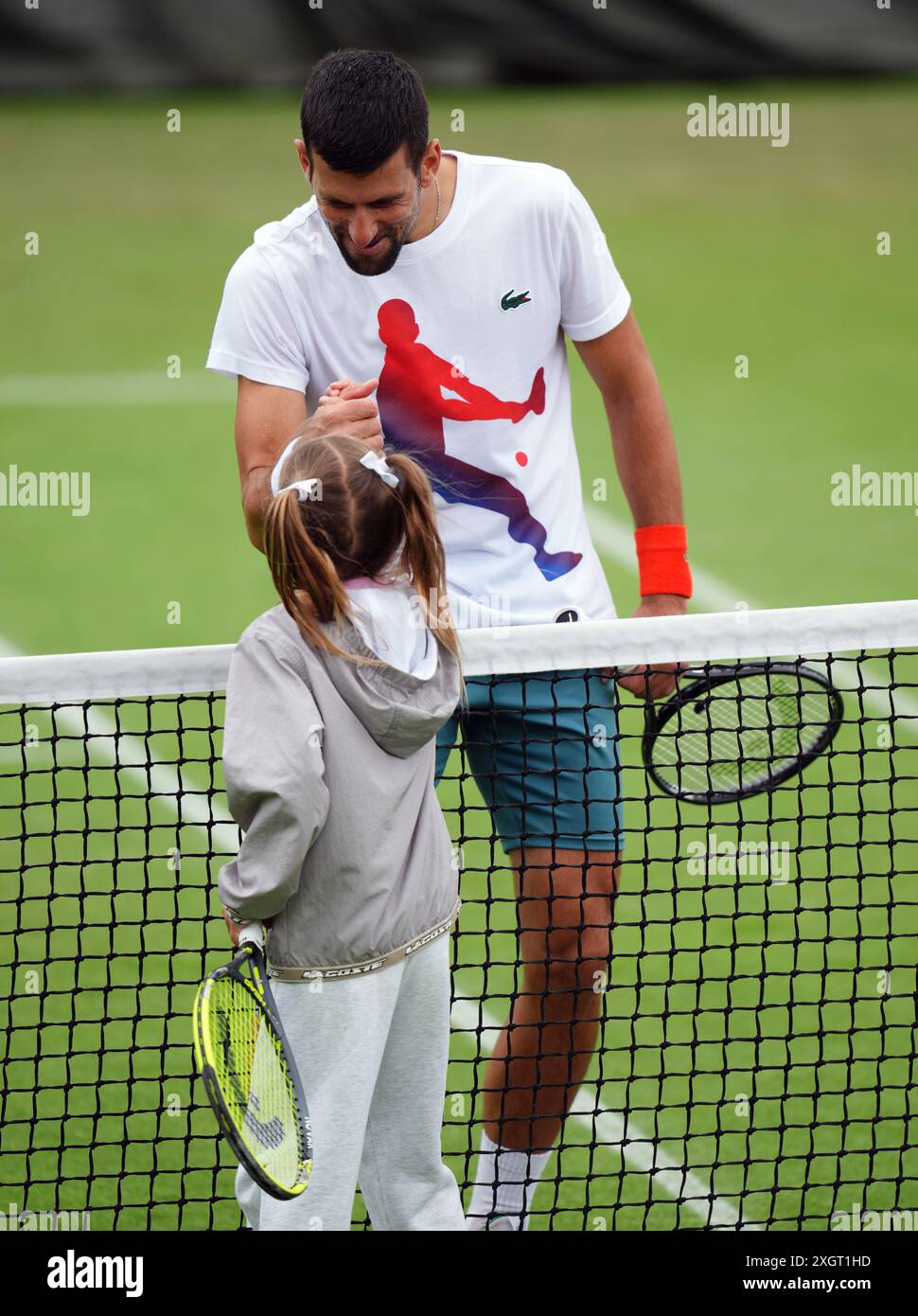 Novak Djokovic with his daughter Tara on day ten of the 2024 Wimbledon ...