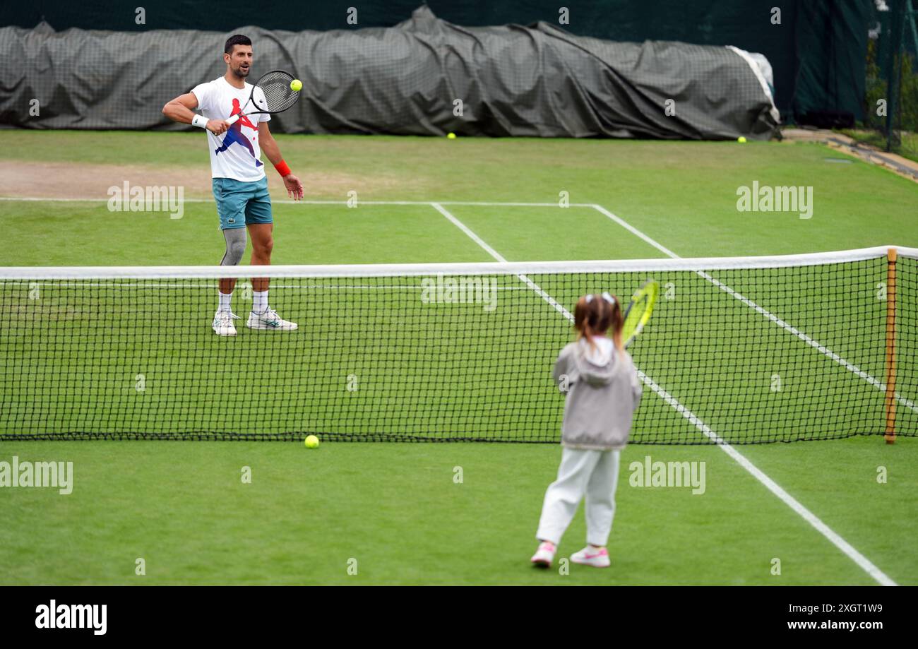 Novak Djokovic with his daughter Tara on day ten of the 2024 Wimbledon ...