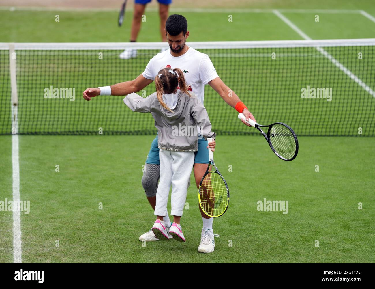 Novak Djokovic with his daughter Tara on day ten of the 2024 Wimbledon ...