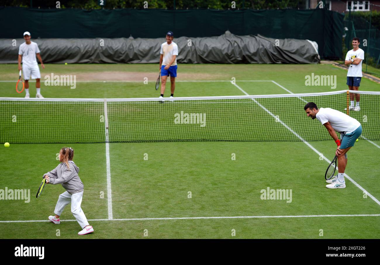 Novak Djokovic with his daughter Tara on day ten of the 2024 Wimbledon ...