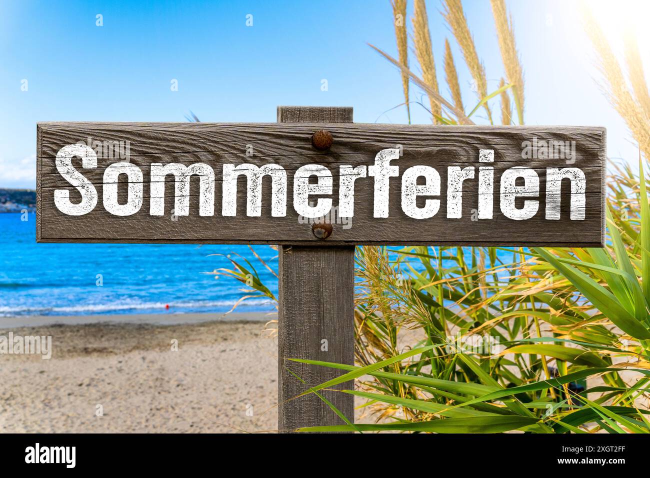 10 July 2024: Summer vacation - sign on the beach. Symbolic image of ...