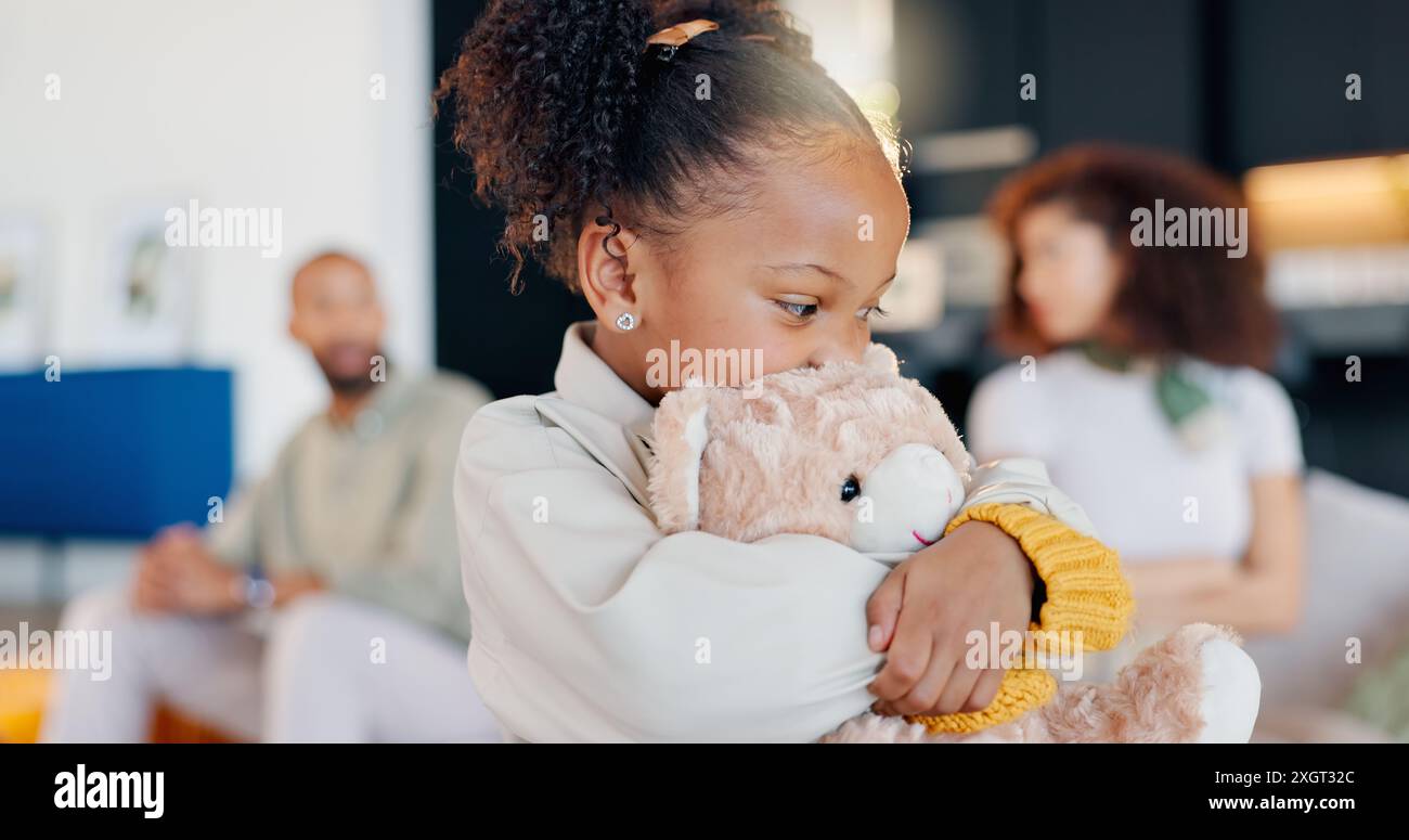 Divorce, parents conflict and kid with teddy bear in home for ...