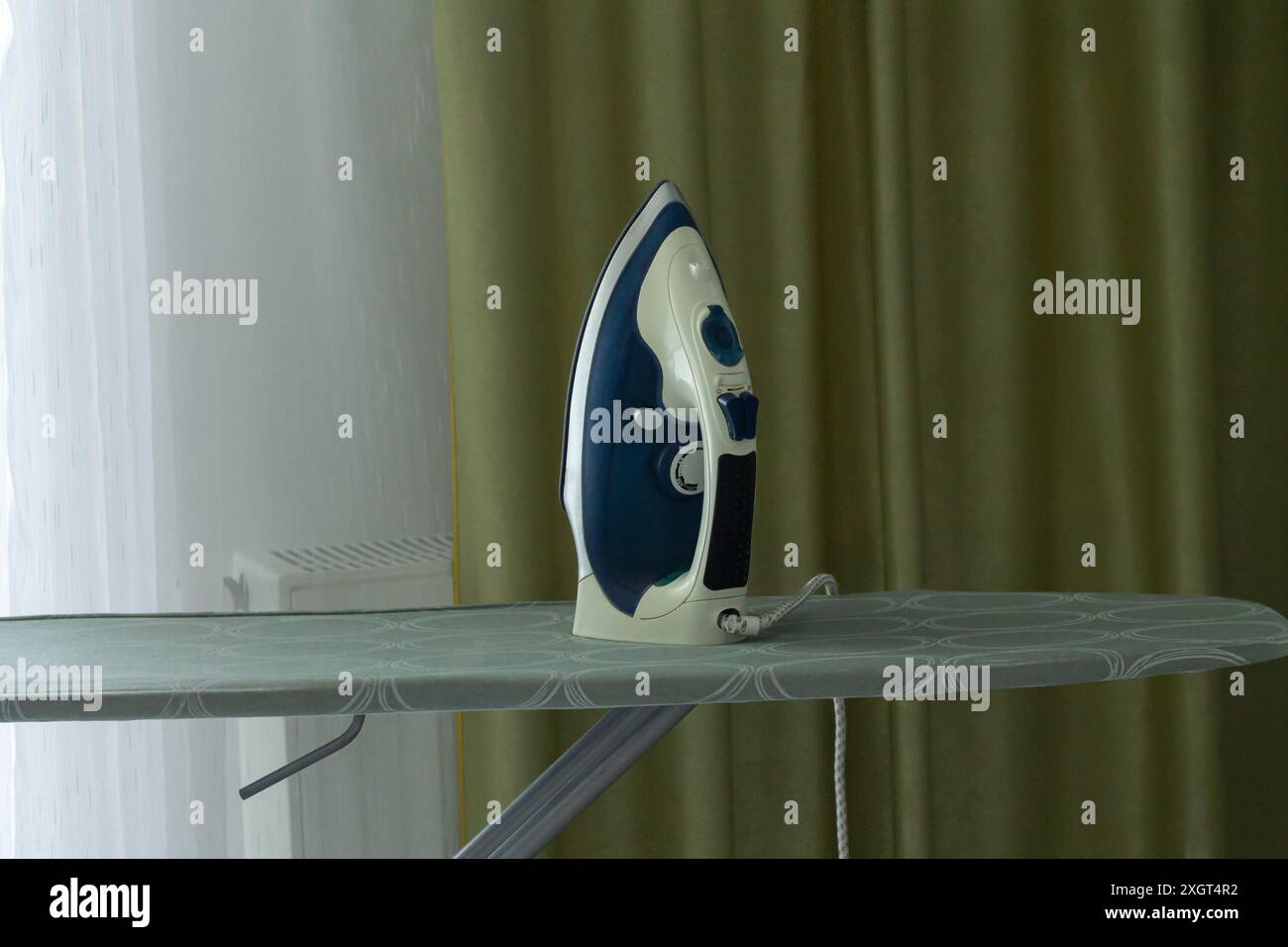 Ironing board modern iron hi-res stock photography and images - Alamy