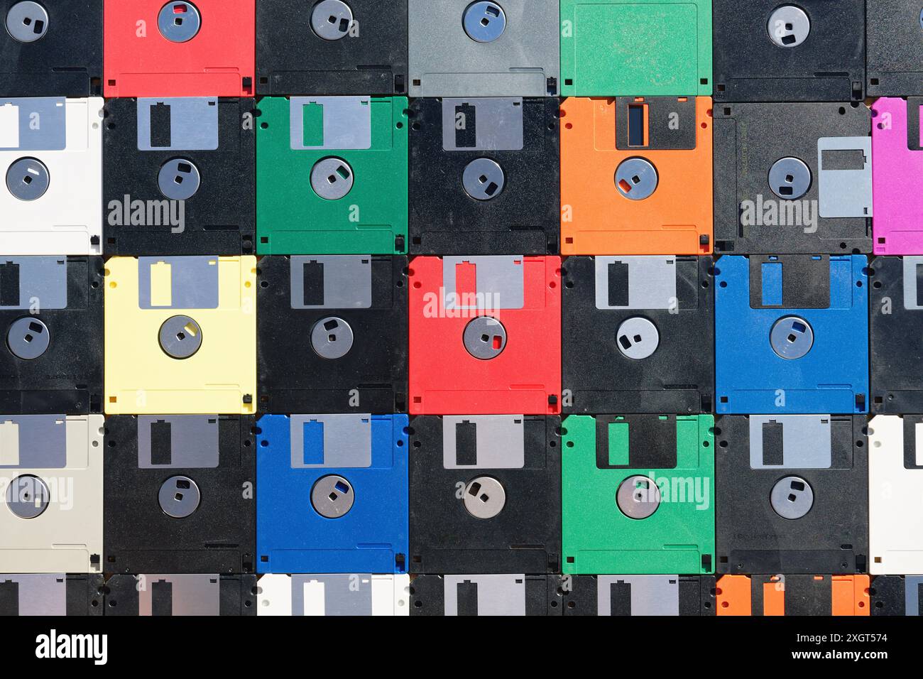 Vintage colored floppy disks background. Old technologies Stock Photo ...