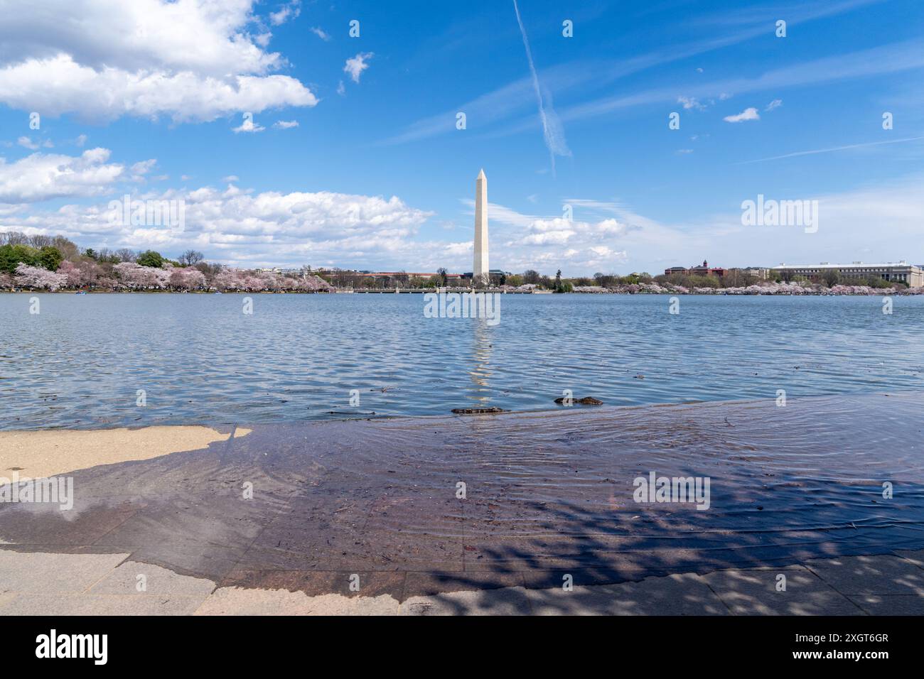 Flooded sidewalks at the tidal basin in Washington DC. A construction ...