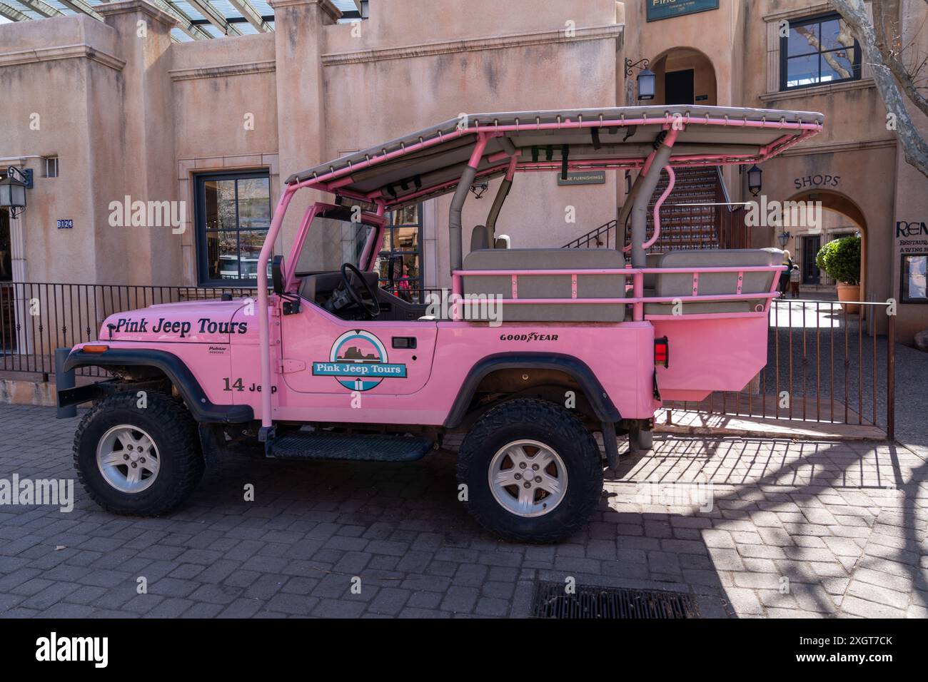 Sedona, Arizona - March 10, 2024: Pink Jeep on display to advertise off ...