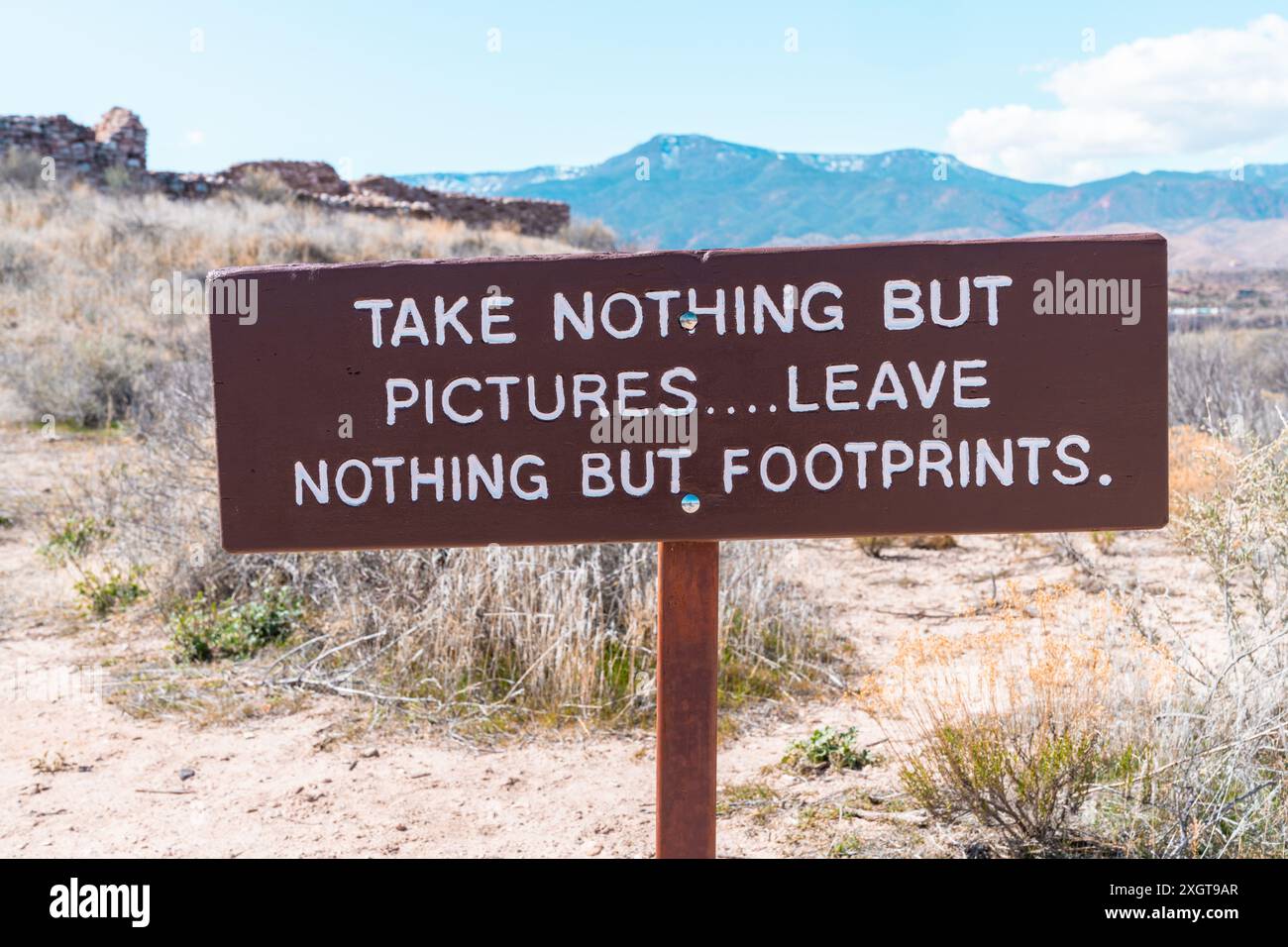 Take nothing but pictures leave nothing but footprints motto on a sign ...