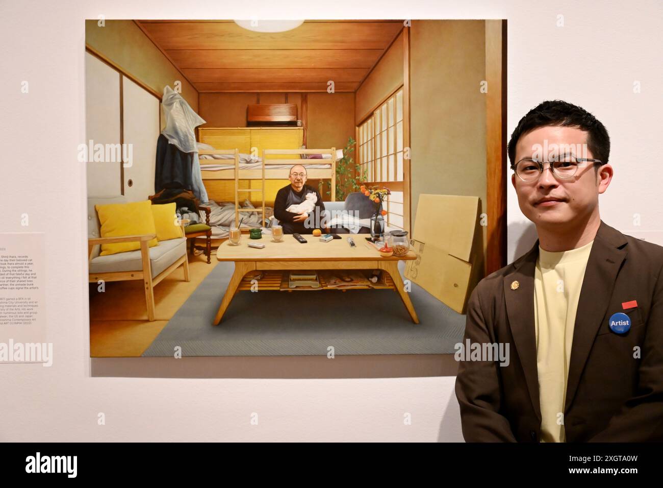 London, UK. Artist Shinji Ihara with his portrait. Herbert Smith ...