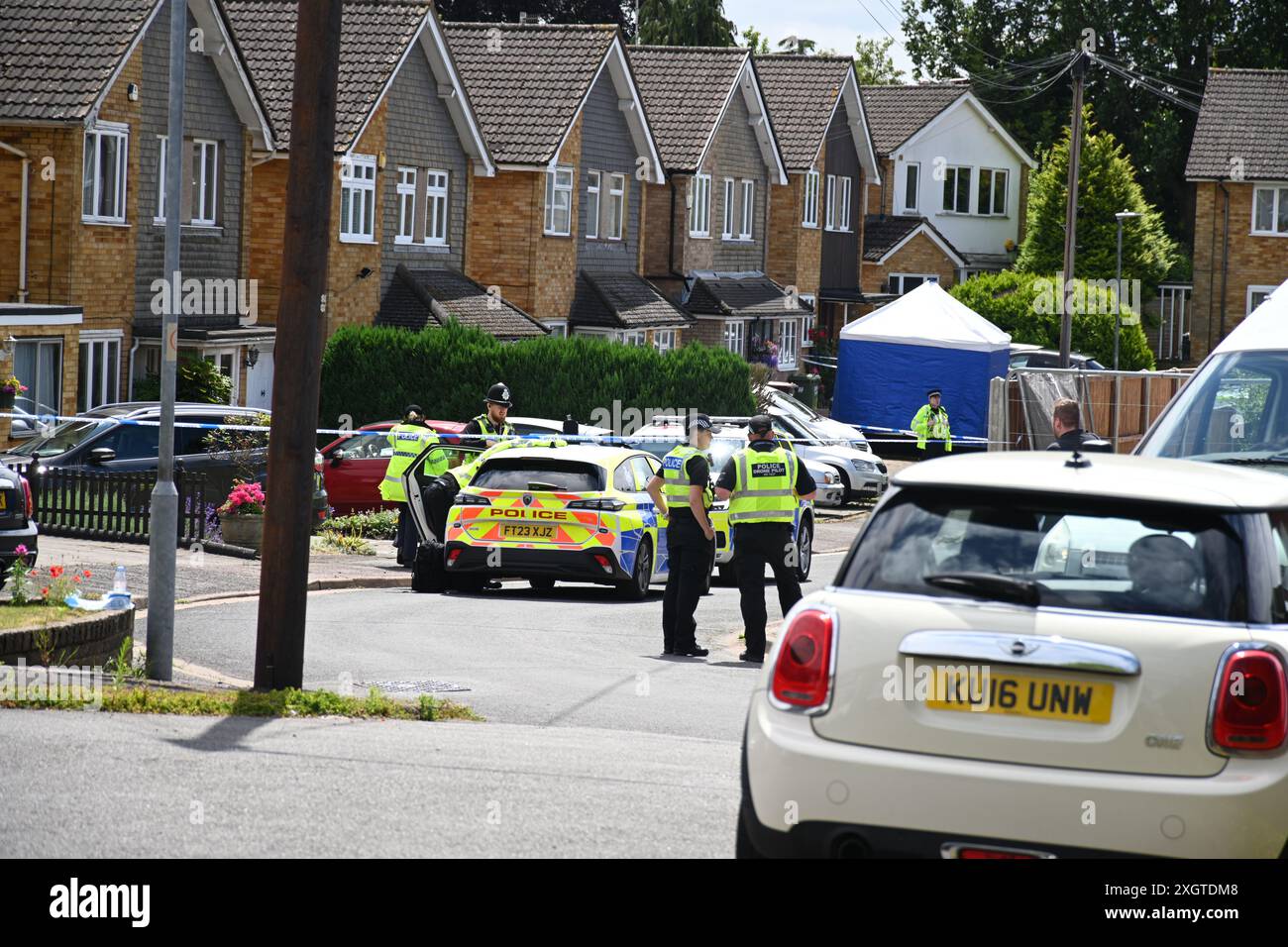 Police at the scene in Ashlyn Close, Bushey, Hertfordshire, where three ...