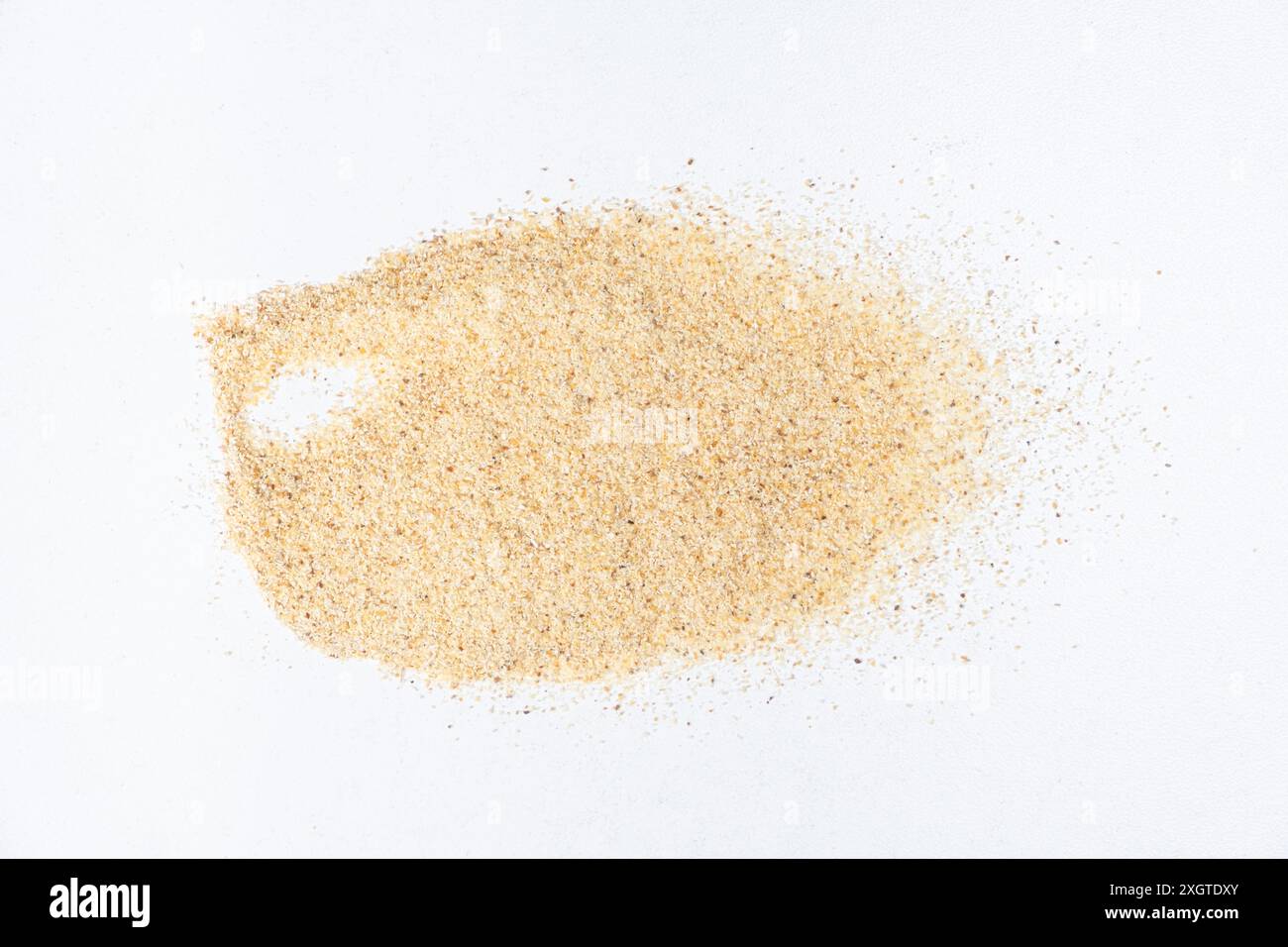 Scattered garlic powder on white background, garlic spice pattern and ...
