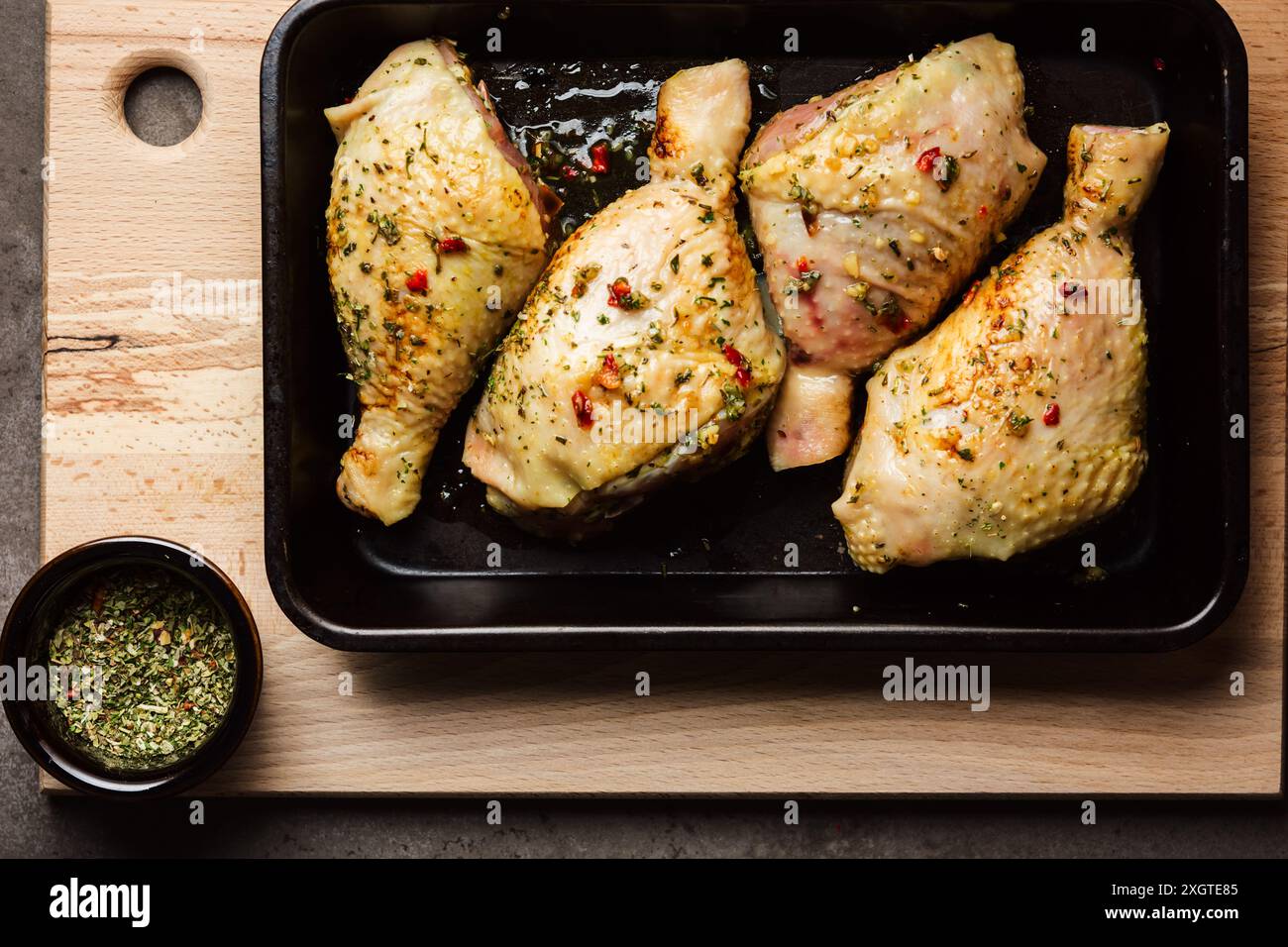Baking chicken legs spices herbs hi-res stock photography and images ...