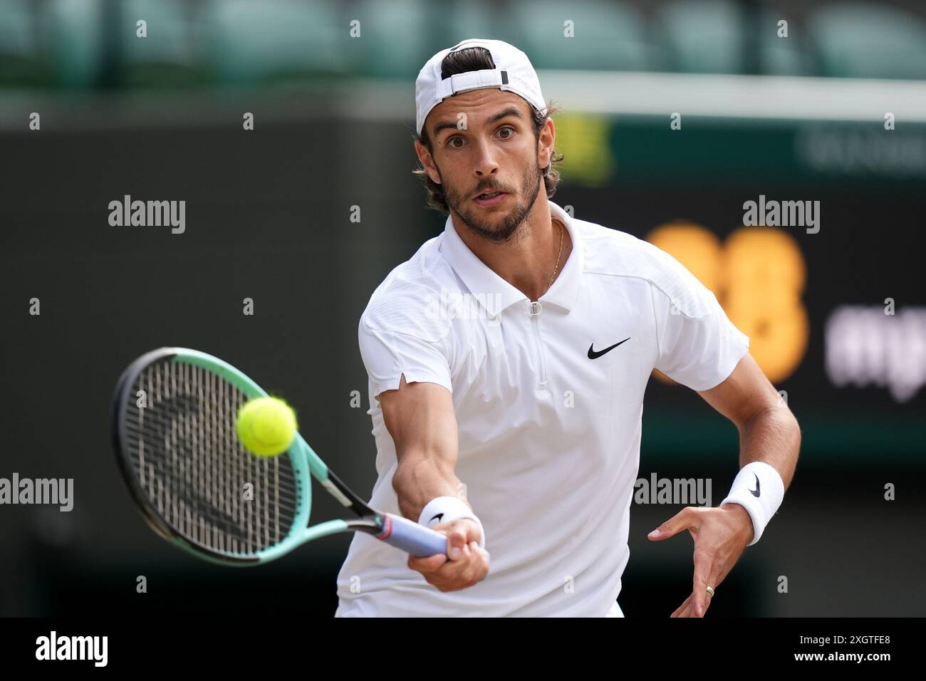 Lorenzo Musetti in action against Taylor Fritz (not pictured) on day ...