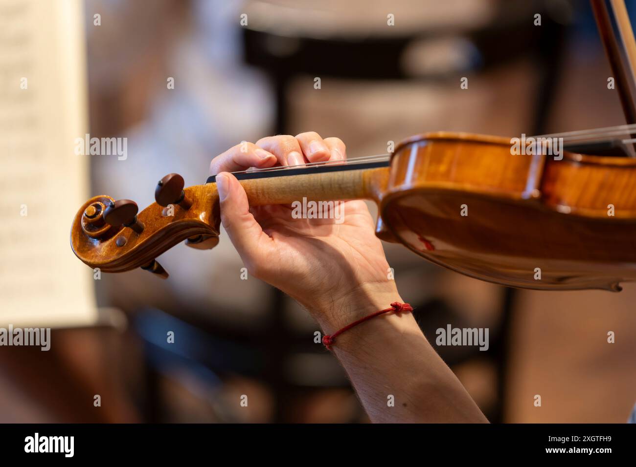 Girl holding violin bow hi-res stock photography and images - Alamy